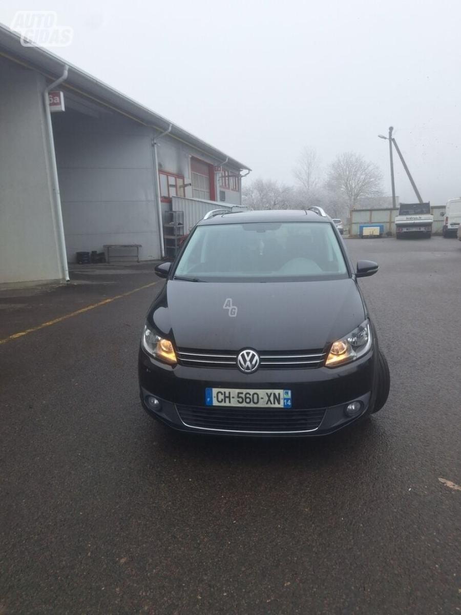 Black Volkswagen Touran 2012 in Vilnius, with an engine capacity of 2.00 L and mileage of 244 thousand km for 6650 €, photo 3 on AUTOMOTO.COM.LV