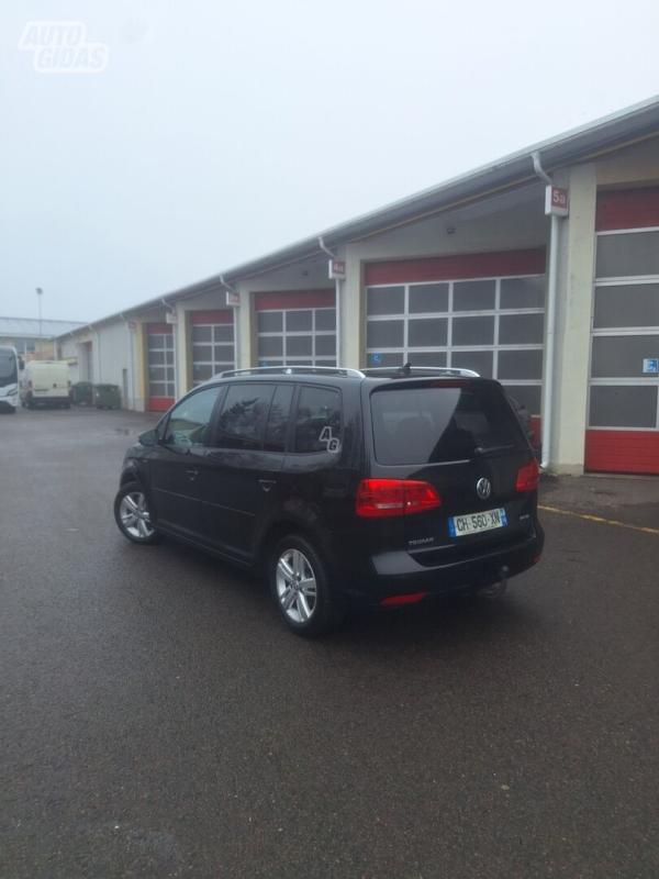 Black Volkswagen Touran 2012 in Vilnius, with an engine capacity of 2.00 L and mileage of 244 thousand km for 6650 €, photo 4 on AUTOMOTO.COM.LV