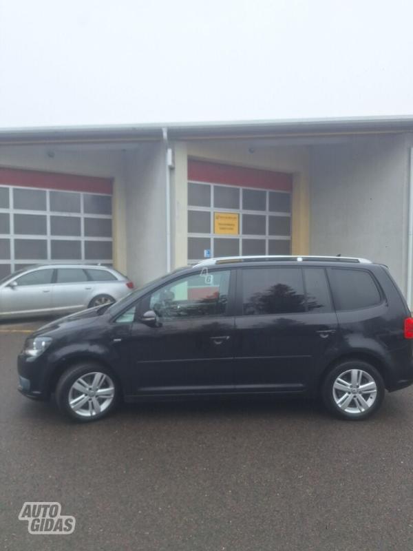 Black Volkswagen Touran 2012 in Vilnius, with an engine capacity of 2.00 L and mileage of 244 thousand km for 6650 €, photo 8 on AUTOMOTO.COM.LV
