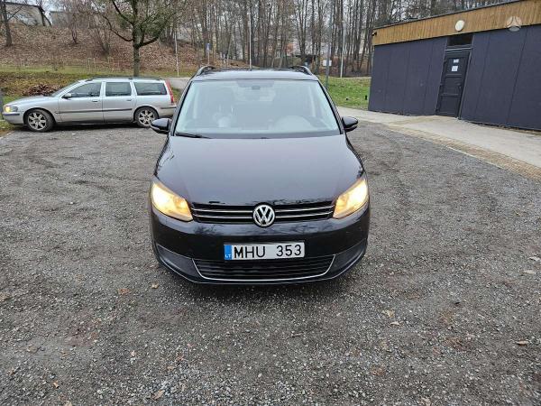 Black Volkswagen Touran 2012 in Kaunas, with an engine capacity of 1.97 L and mileage of 312 thousand km for 4200 €, photo 6 on AUTOMOTO.COM.LV