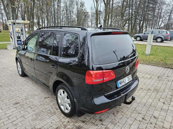 Black Volkswagen Touran 2012 in Kaunas, with an engine capacity of 1.97 L and mileage of 312 thousand km for 4200 €, photo 7 on AUTOMOTO.COM.LV