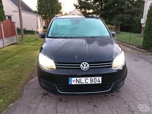 Black Volkswagen Touran 2012 in Kelme, with an engine capacity of 2.00 L and mileage of 326 thousand km for 5100 €, photo 3 on AUTOMOTO.COM.LV