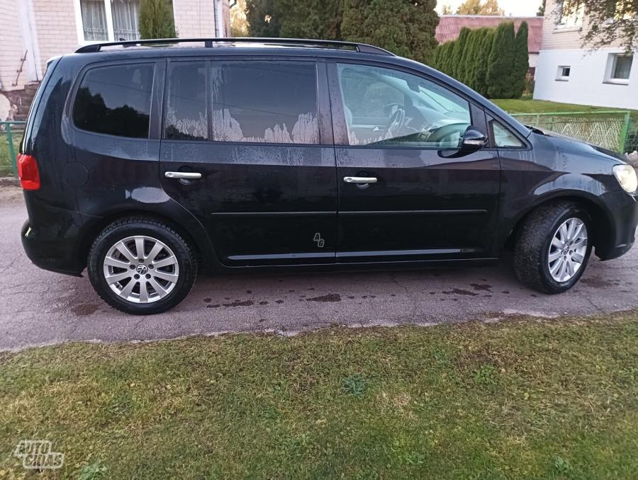 Black Volkswagen Touran 2012 in Kelme, with an engine capacity of 2.00 L and mileage of 326 thousand km for 5100 €, photo 9 on AUTOMOTO.COM.LV