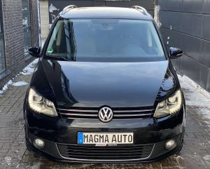 Black Volkswagen Touran 2012 in Marijampole, with an engine capacity of 1.97 L and mileage of 296 thousand km for 6750 €, photo 3 on AUTOMOTO.COM.LV