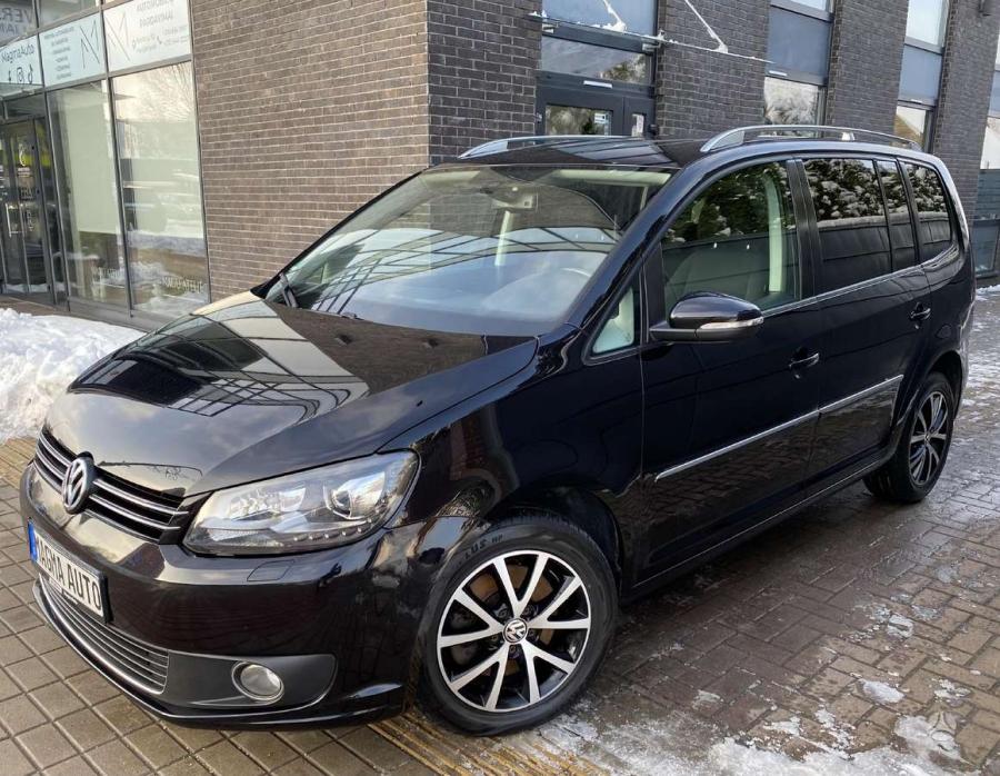 Black Volkswagen Touran 2012 in Marijampole, with an engine capacity of 1.97 L and mileage of 296 thousand km for 6750 €, photo 6 on AUTOMOTO.COM.LV