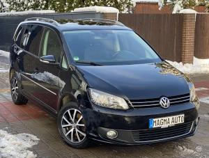 Black Volkswagen Touran 2012 in Marijampole, with an engine capacity of 1.97 L and mileage of 296 thousand km for 6750 €, photo 9 on AUTOMOTO.COM.LV