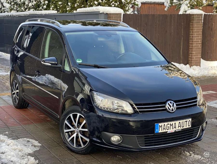 Black Volkswagen Touran 2012 in Marijampole, with an engine capacity of 1.97 L and mileage of 296 thousand km for 6750 €, photo 9 on AUTOMOTO.COM.LV