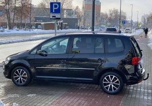 Black Volkswagen Touran 2012 in Marijampole, with an engine capacity of 1.97 L and mileage of 296 thousand km for 6750 €, photo 10 on AUTOMOTO.COM.LV