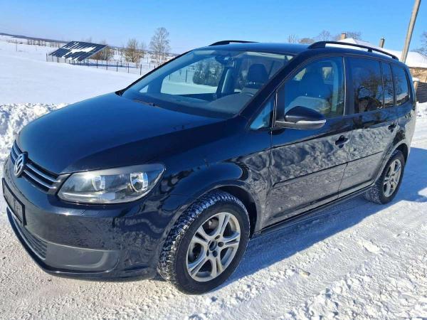 Black Volkswagen Touran 2012 in Raseiniai, with an engine capacity of 1.60 L and mileage of 260 thousand km for 4300 €, photo 10 on AUTOMOTO.COM.LV