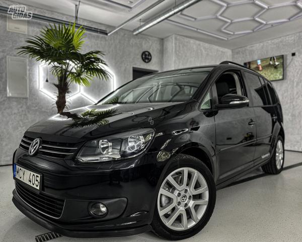 Black Volkswagen Touran 2012 in Kaunas, with an engine capacity of 2.00 L and mileage of 314 thousand km for 5350 €, photo 1 on AUTOMOTO.COM.LV