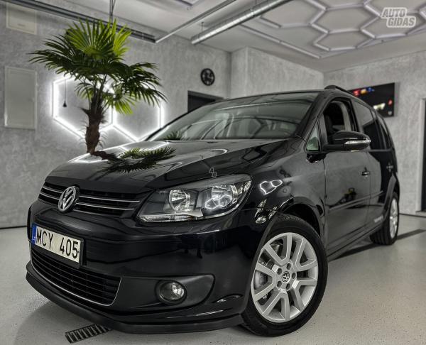 Black Volkswagen Touran 2012 in Kaunas, with an engine capacity of 2.00 L and mileage of 314 thousand km for 5350 €, photo 3 on AUTOMOTO.COM.LV