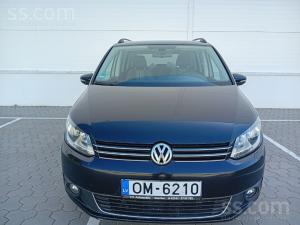 Black Volkswagen Touran 2012 in Riga, with an engine capacity of 2.00 L and mileage of 183 thousand km for 6780 €, photo 3 on AUTOMOTO.COM.LV