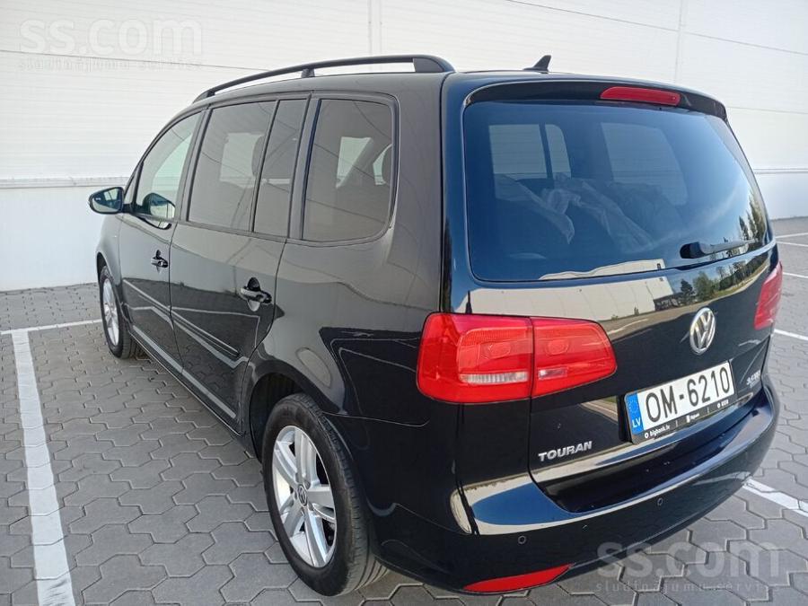 Black Volkswagen Touran 2012 in Riga, with an engine capacity of 2.00 L and mileage of 183 thousand km for 6780 €, photo 7 on AUTOMOTO.COM.LV