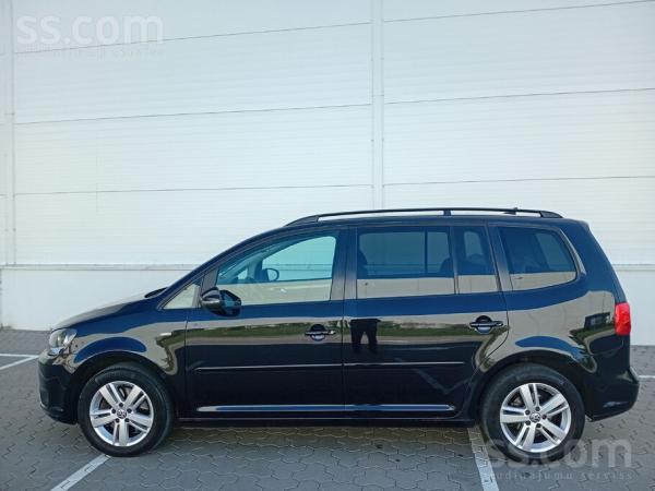 Melns Volkswagen Touran 2012 Rīga, ar dzinēja tilpumu 2.00 L un nobraukumu 183 tūkst. km par 6780 €, foto 8 vietnē AUTOMOTO.COM.LV