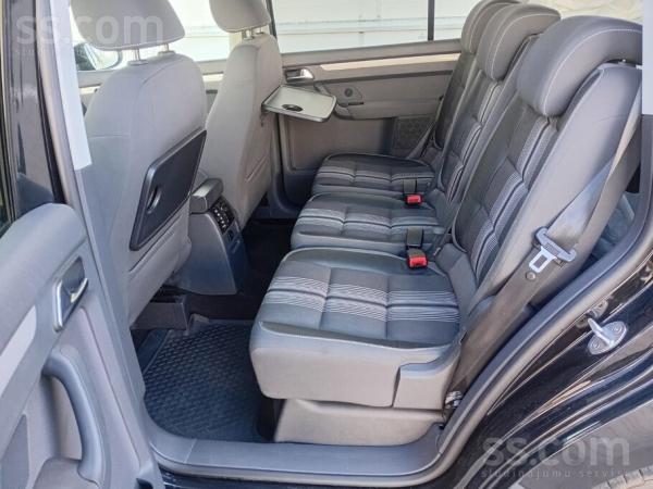 Melns Volkswagen Touran 2012 Rīga, ar dzinēja tilpumu 2.00 L un nobraukumu 183 tūkst. km par 6780 €, foto 10 vietnē AUTOMOTO.COM.LV