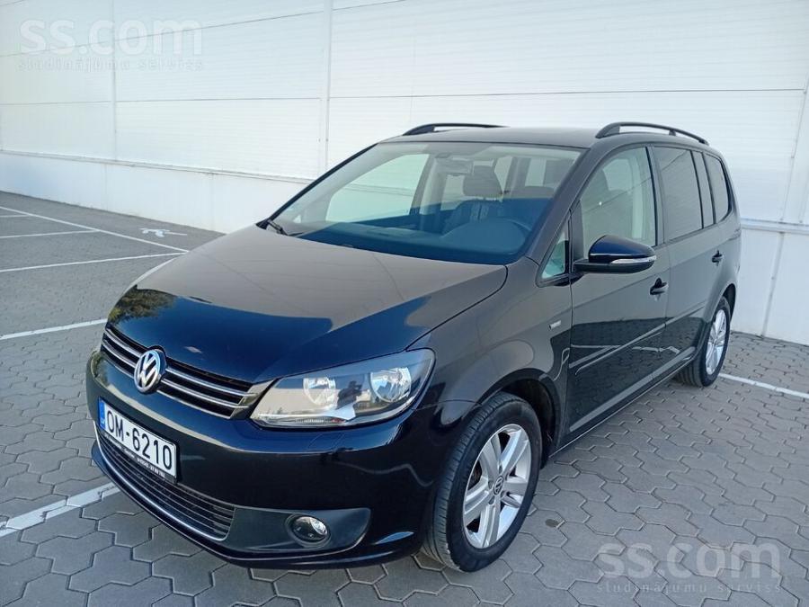 Black Volkswagen Touran 2012 in Riga, with an engine capacity of 2.00 L and mileage of 183 thousand km for 6780 €, photo 1 on AUTOMOTO.COM.LV