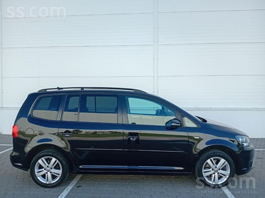 Black Volkswagen Touran 2012 in Riga, with an engine capacity of 2.00 L and mileage of 183 thousand km for 6780 €, photo 8 on AUTOMOTO.COM.LV