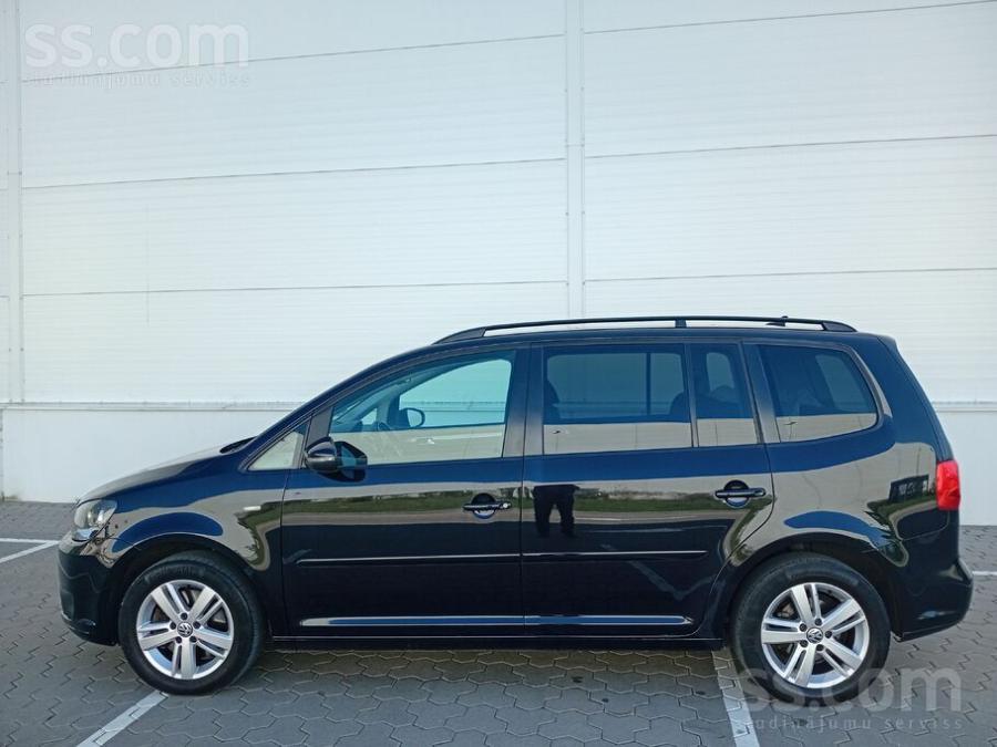 Black Volkswagen Touran 2012 in Riga, with an engine capacity of 2.00 L and mileage of 183 thousand km for 6780 €, photo 9 on AUTOMOTO.COM.LV