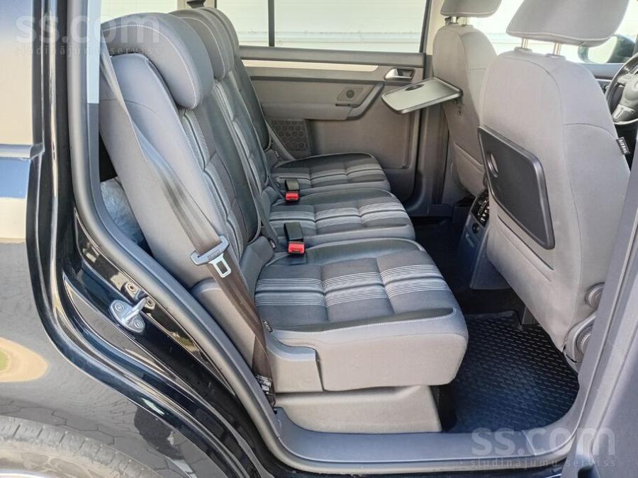 Black Volkswagen Touran 2012 in Riga, with an engine capacity of 2.00 L and mileage of 183 thousand km for 6780 €, photo 13 on AUTOMOTO.COM.LV