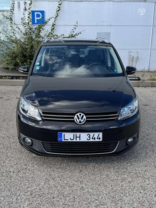 Black Volkswagen Touran 2012 in Kaunas, with an engine capacity of 2.00 L and mileage of 284 thousand km for 6800 €, photo 2 on AUTOMOTO.COM.LV