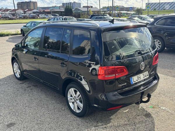 Black Volkswagen Touran 2012 in Kaunas, with an engine capacity of 2.00 L and mileage of 284 thousand km for 6800 €, photo 4 on AUTOMOTO.COM.LV