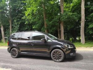 Black Volkswagen Touran 2012 in Marijampole, with an engine capacity of 1.40 L and mileage of 207 thousand km for 4750 €, photo 16 on AUTOMOTO.COM.LV
