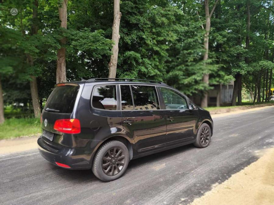 Black Volkswagen Touran 2012 in Marijampole, with an engine capacity of 1.40 L and mileage of 207 thousand km for 4750 €, photo 19 on AUTOMOTO.COM.LV