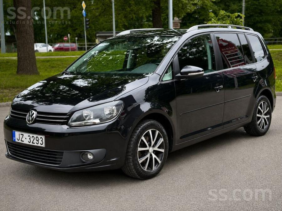 Melns Volkswagen Touran 2012 Rīga, ar dzinēja tilpumu 1.60 L un nobraukumu 238 tūkst. km par 5500 €, foto 4 vietnē AUTOMOTO.COM.LV