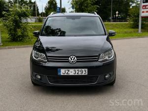 Melns Volkswagen Touran 2012 Rīga, ar dzinēja tilpumu 1.60 L un nobraukumu 238 tūkst. km par 5500 €, foto 8 vietnē AUTOMOTO.COM.LV