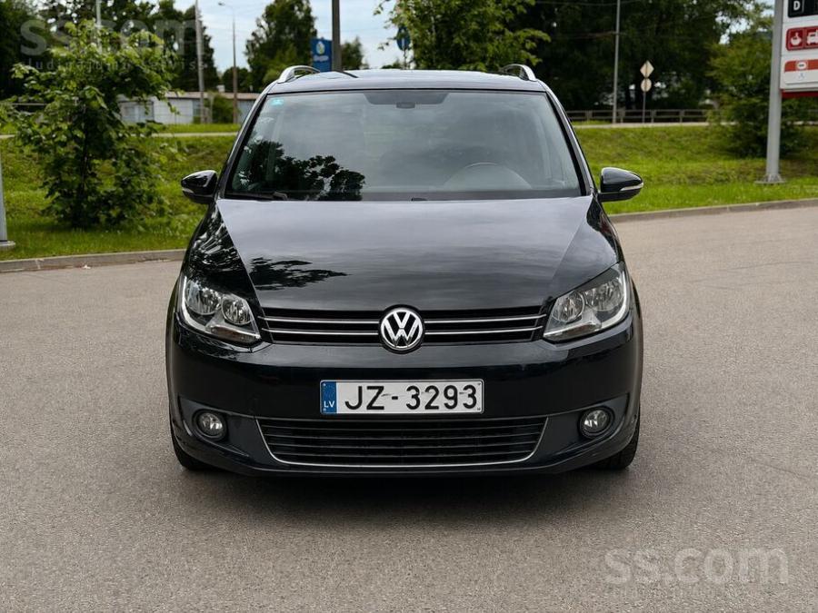 Melns Volkswagen Touran 2012 Rīga, ar dzinēja tilpumu 1.60 L un nobraukumu 238 tūkst. km par 5500 €, foto 8 vietnē AUTOMOTO.COM.LV