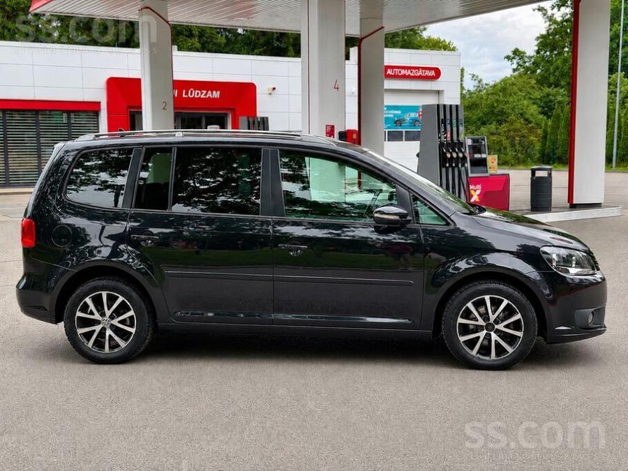 Melns Volkswagen Touran 2012 Rīga, ar dzinēja tilpumu 1.60 L un nobraukumu 238 tūkst. km par 5500 €, foto 11 vietnē AUTOMOTO.COM.LV