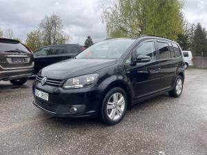 Black Volkswagen Touran 2012 in Riga, with an engine capacity of 1.60 L and mileage of 393 thousand km for 6290 €, photo  on AUTOMOTO.COM.LV