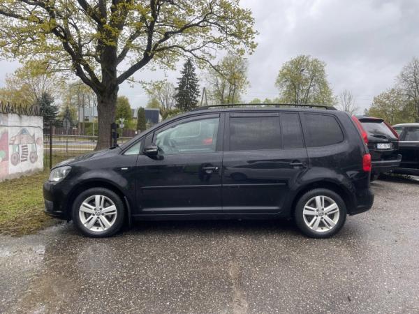 Melns Volkswagen Touran 2012 Rīga, ar dzinēja tilpumu 1.60 L un nobraukumu 393 tūkst. km par 6290 €, foto 8 vietnē AUTOMOTO.COM.LV