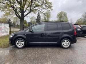 Melns Volkswagen Touran 2012 Rīga, ar dzinēja tilpumu 1.60 L un nobraukumu 393 tūkst. km par 6290 €, foto 9 vietnē AUTOMOTO.COM.LV