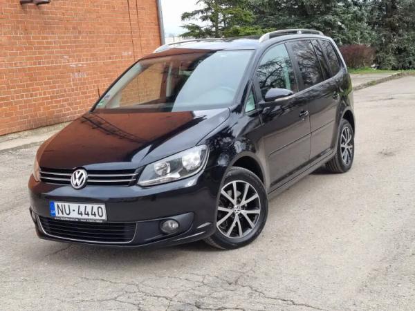 Black Volkswagen Touran 2012 in Jekabpils, with an engine capacity of 1.60 L and mileage of 261 thousand km for 6650 €, photo 1 on AUTOMOTO.COM.LV