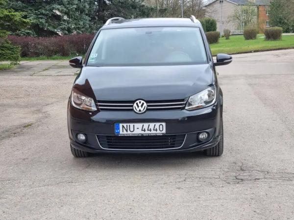 Black Volkswagen Touran 2012 in Jekabpils, with an engine capacity of 1.60 L and mileage of 261 thousand km for 6650 €, photo 2 on AUTOMOTO.COM.LV