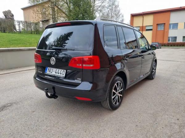 Black Volkswagen Touran 2012 in Jekabpils, with an engine capacity of 1.60 L and mileage of 261 thousand km for 6650 €, photo 6 on AUTOMOTO.COM.LV