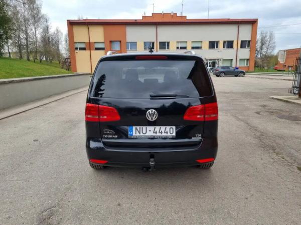 Black Volkswagen Touran 2012 in Jekabpils, with an engine capacity of 1.60 L and mileage of 261 thousand km for 6650 €, photo 7 on AUTOMOTO.COM.LV