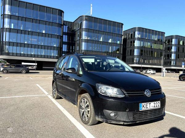 Black Volkswagen Touran 2012 in Kaunas, with an engine capacity of 1.60 L and mileage of 246 thousand km for 5400 €, photo 1 on AUTOMOTO.COM.LV