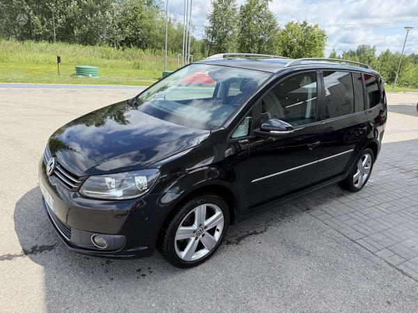Black Volkswagen Touran 2012 in Taurage, with an engine capacity of 1.97 L and mileage of 227 thousand km for 6500 €, photo 1 on AUTOMOTO.COM.LV