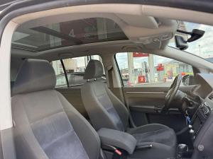 Melns Volkswagen Touran 2012 Tauragė, ar dzinēja tilpumu 1.97 L un nobraukumu 227 tūkst. km par 6500 €, foto 16 vietnē AUTOMOTO.COM.LV