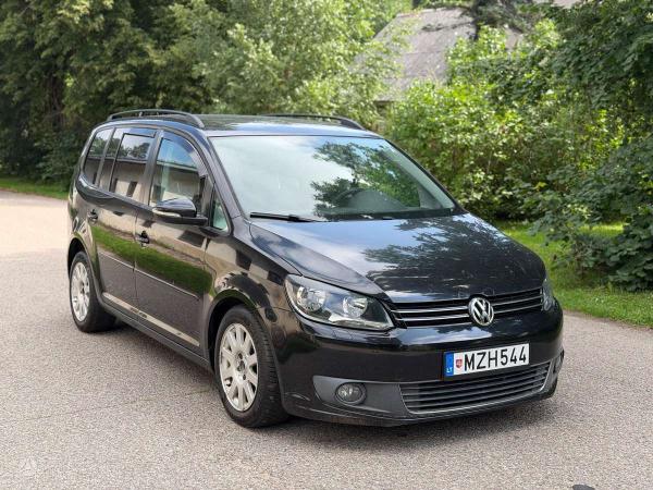 Black Volkswagen Touran 2012 in Vilnius, with an engine capacity of 0.00 L and mileage of 205 thousand km for 2800 €, photo 1 on AUTOMOTO.COM.LV