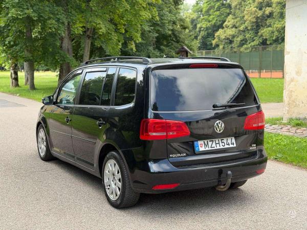 Black Volkswagen Touran 2012 in Vilnius, with an engine capacity of 0.00 L and mileage of 205 thousand km for 2800 €, photo 4 on AUTOMOTO.COM.LV