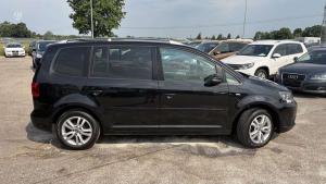 Black Volkswagen Touran 2012 in Marijampole, with an engine capacity of 1.97 L and mileage of 246 thousand km for 6000 €, photo 3 on AUTOMOTO.COM.LV