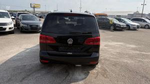 Black Volkswagen Touran 2012 in Marijampole, with an engine capacity of 1.97 L and mileage of 246 thousand km for 6000 €, photo 5 on AUTOMOTO.COM.LV