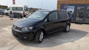 Black Volkswagen Touran 2012 in Marijampole, with an engine capacity of 1.97 L and mileage of 246 thousand km for 6000 €, photo 8 on AUTOMOTO.COM.LV