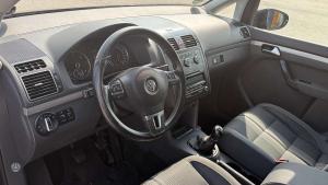 Black Volkswagen Touran 2012 in Marijampole, with an engine capacity of 1.97 L and mileage of 246 thousand km for 6000 €, photo 15 on AUTOMOTO.COM.LV
