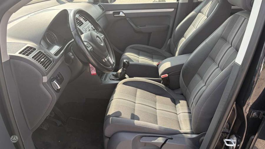 Black Volkswagen Touran 2012 in Marijampole, with an engine capacity of 1.97 L and mileage of 246 thousand km for 6000 €, photo 20 on AUTOMOTO.COM.LV