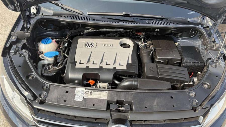 Black Volkswagen Touran 2012 in Marijampole, with an engine capacity of 1.97 L and mileage of 246 thousand km for 6000 €, photo 21 on AUTOMOTO.COM.LV