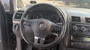 Black Volkswagen Touran 2012 in Marijampole, with an engine capacity of 1.97 L and mileage of 246 thousand km for 6000 €, photo 24 on AUTOMOTO.COM.LV